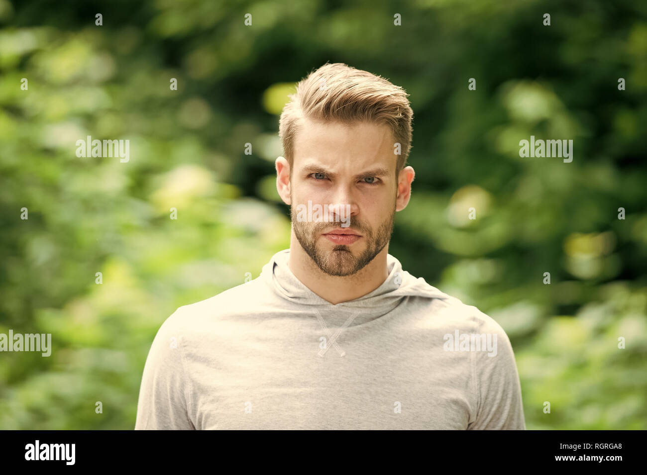 Guy bearded and attractive cares about appearance. Man with bristle on ...