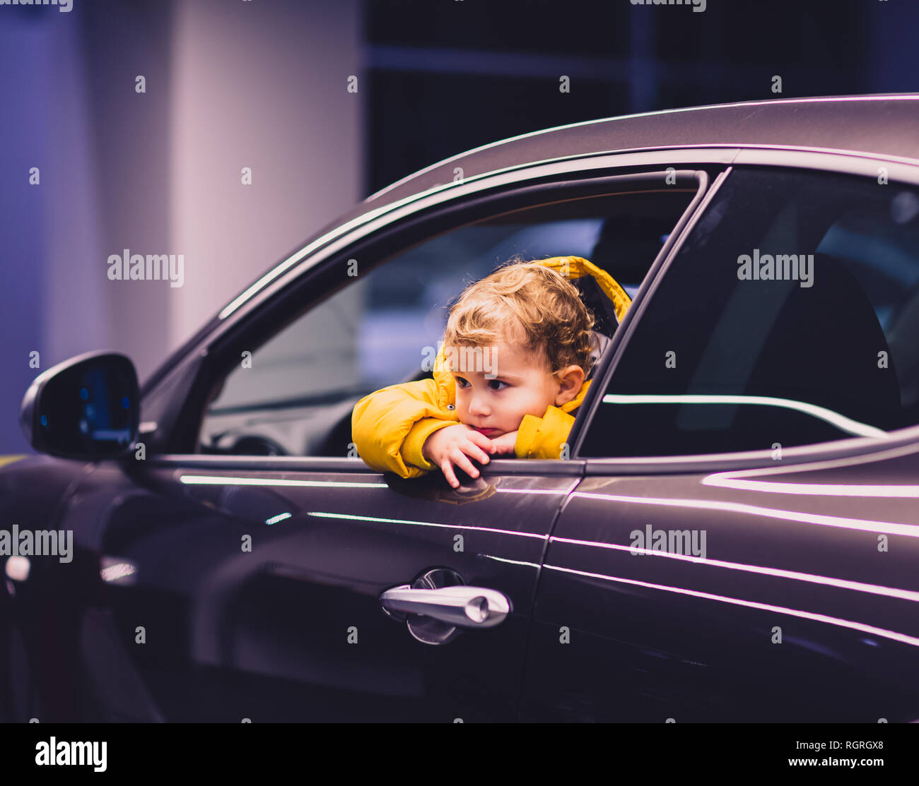 toddler boy waiting in the car Stock Photo - Alamy