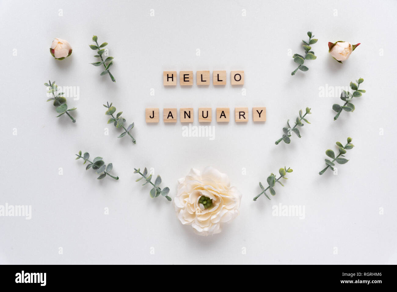 Hello January words on white marble background Stock Photo - Alamy