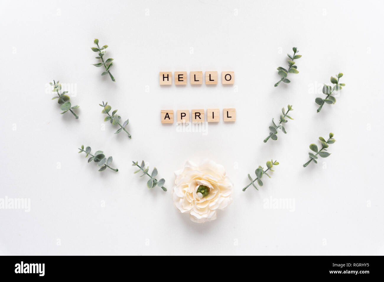 Hello April words on white marble background Stock Photo - Alamy