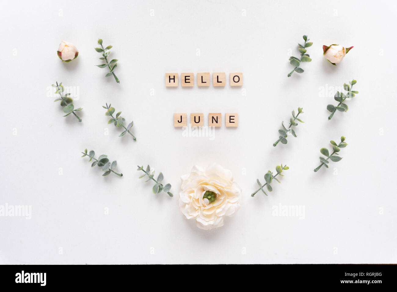 Hello June words on white marble background Stock Photo - Alamy