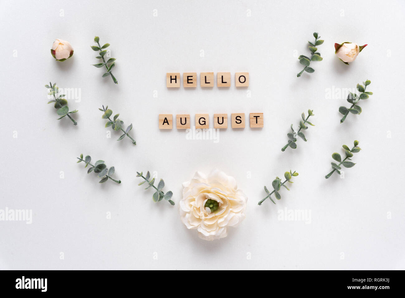 Hello August words on white marble background Stock Photo - Alamy
