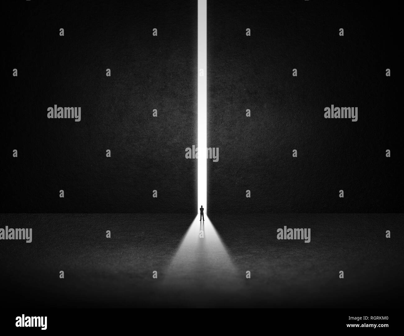 businessman stand at the exit way with light in the darkness Stock ...