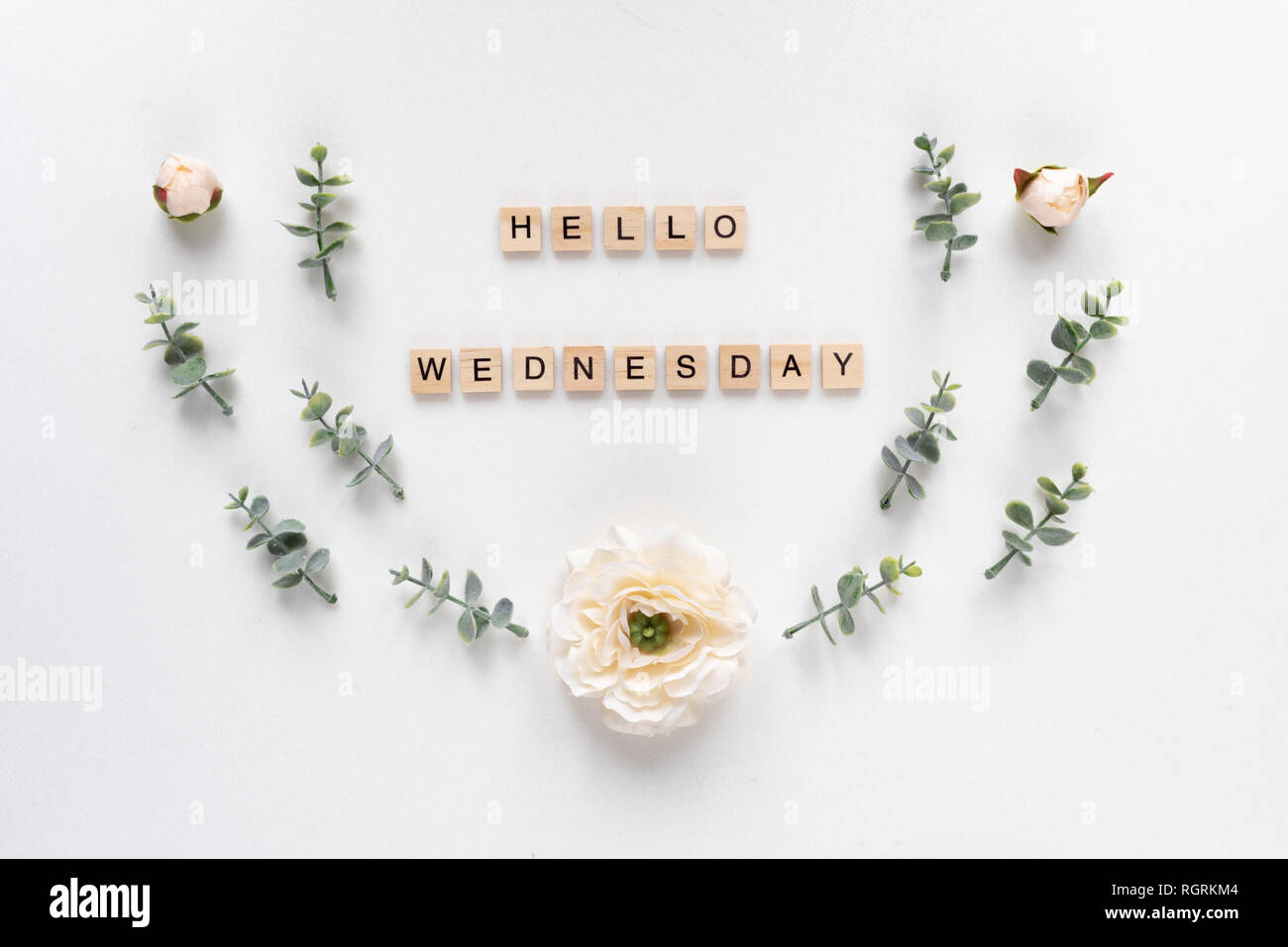 Hello Wednesday words on white marble background Stock Photo - Alamy