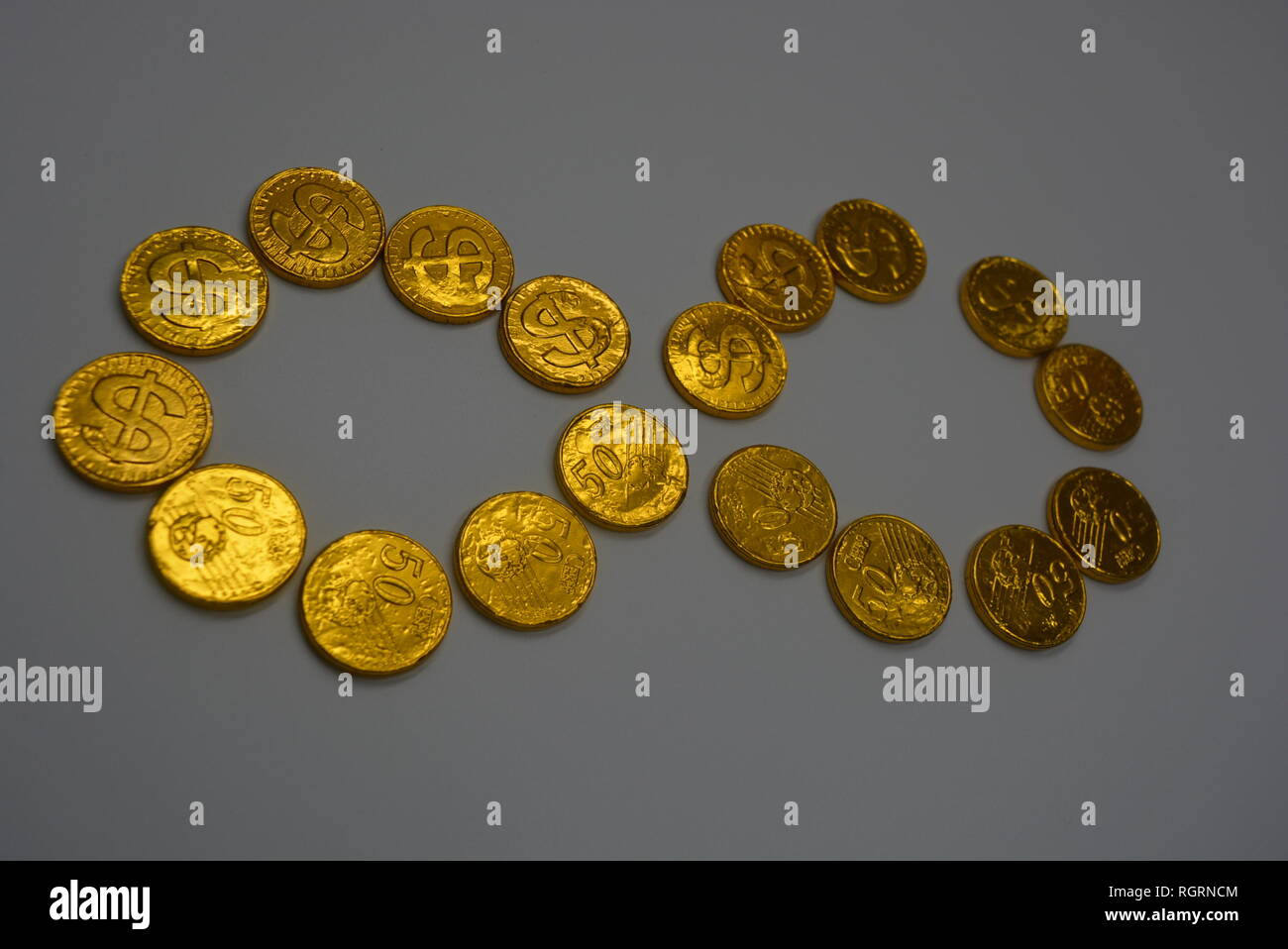 Sweet chocolates are in the form of gold coins. Gold cents with a ...