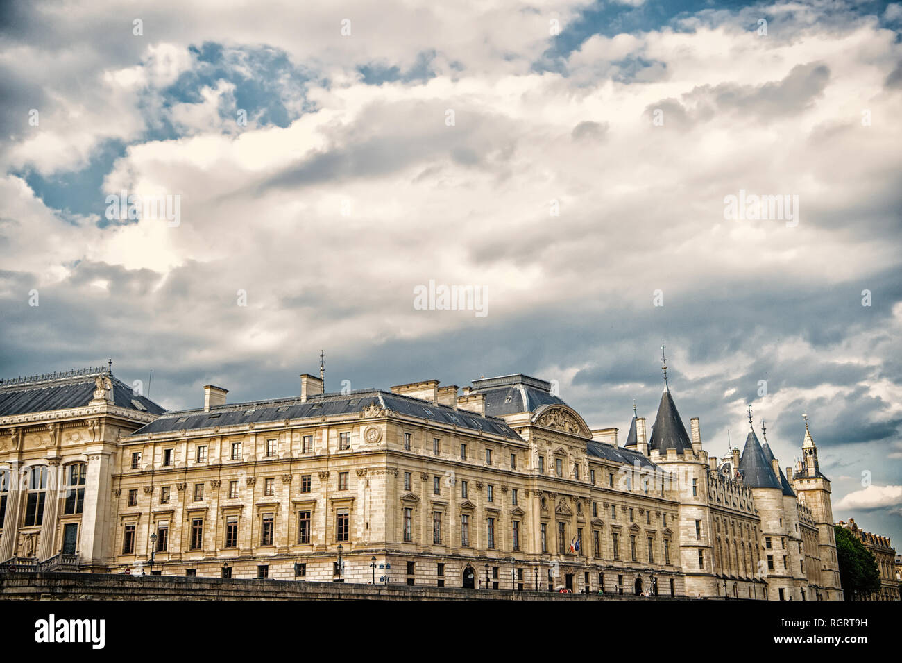 Palais de la Cite in Paris, France. Palace building with towers on ...