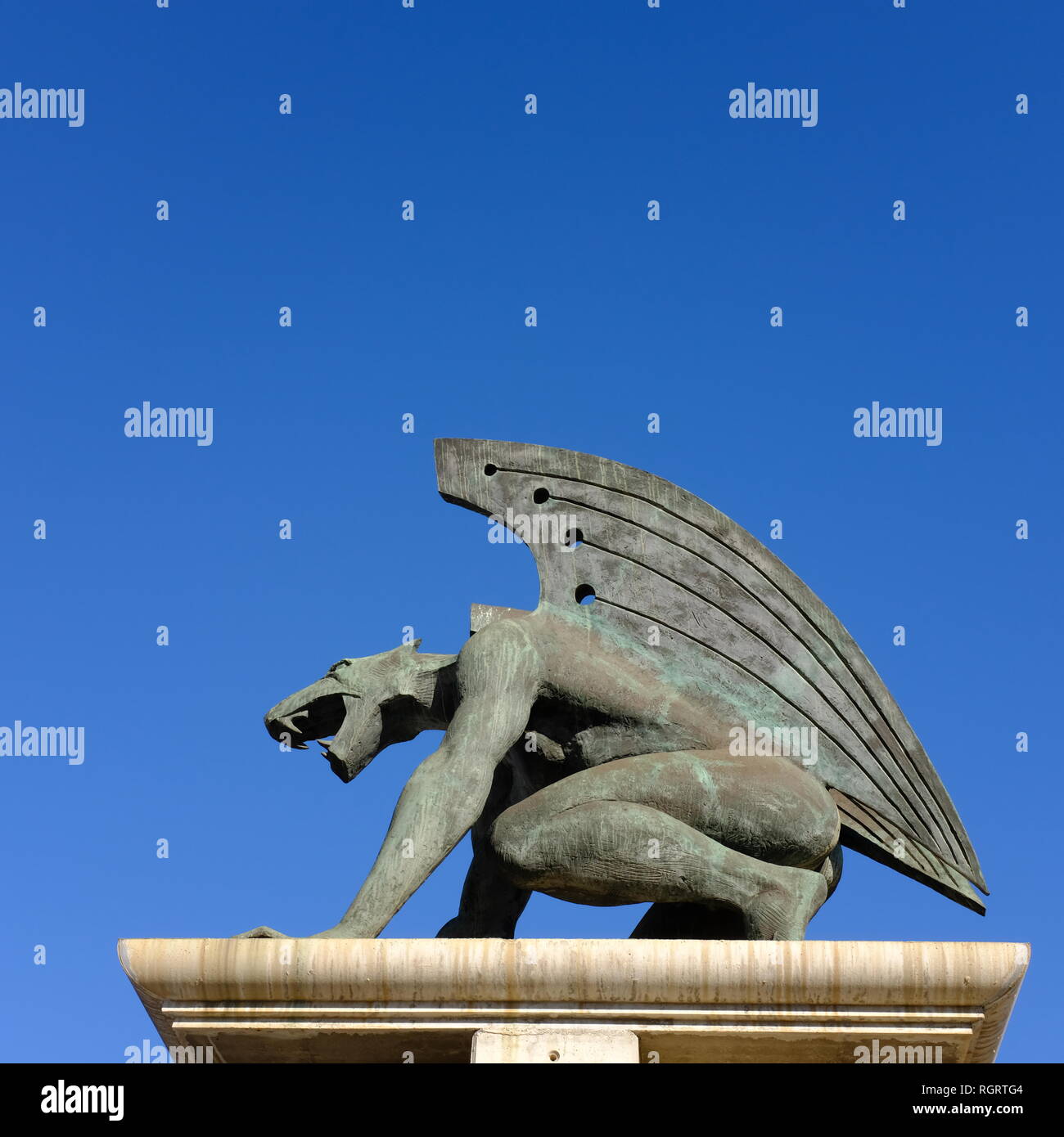 Mythical Creature Griffin Gryphon Statue on top of a plinth Stock Photo ...