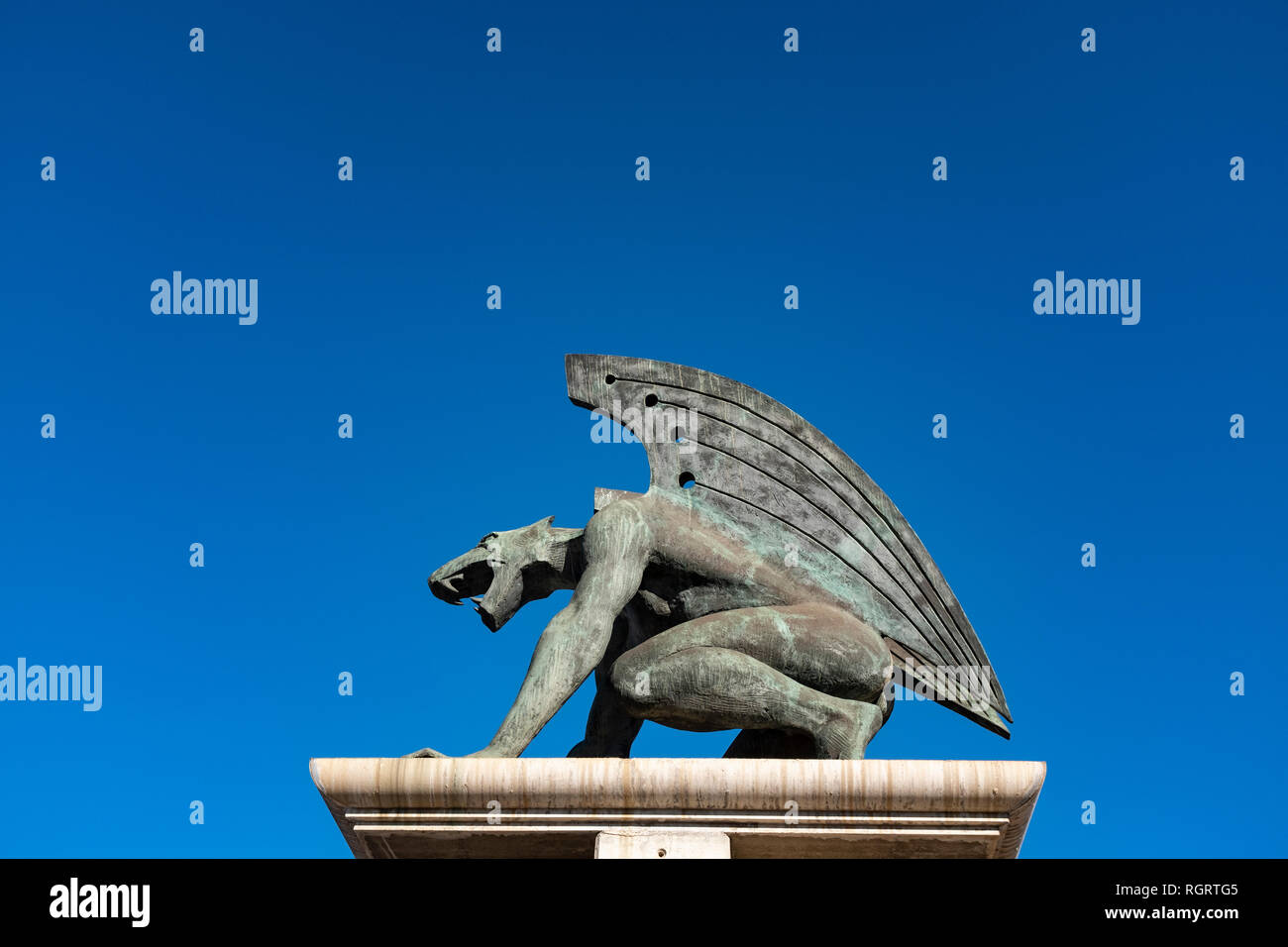 Mythical Creature Griffin Gryphon Statue on top of a plinth Stock Photo ...