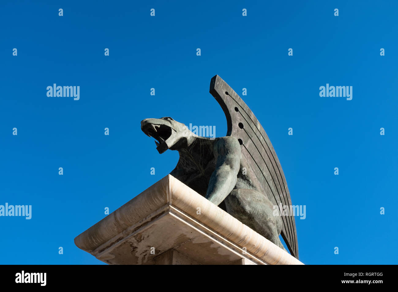 Mythical Creature Griffin Gryphon Statue on top of a plinth Stock Photo ...