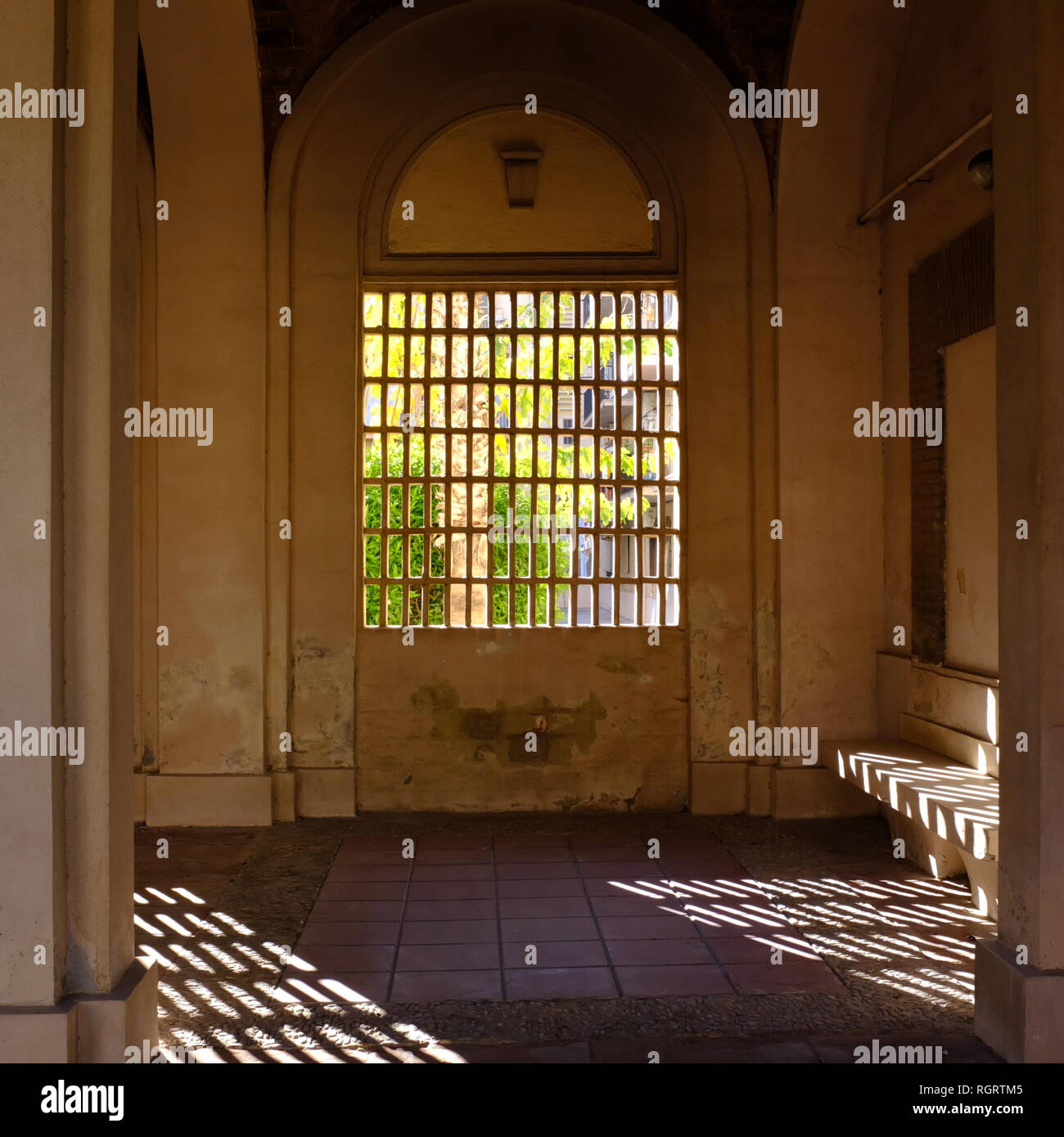 Grilled arched window hi-res stock photography and images - Alamy