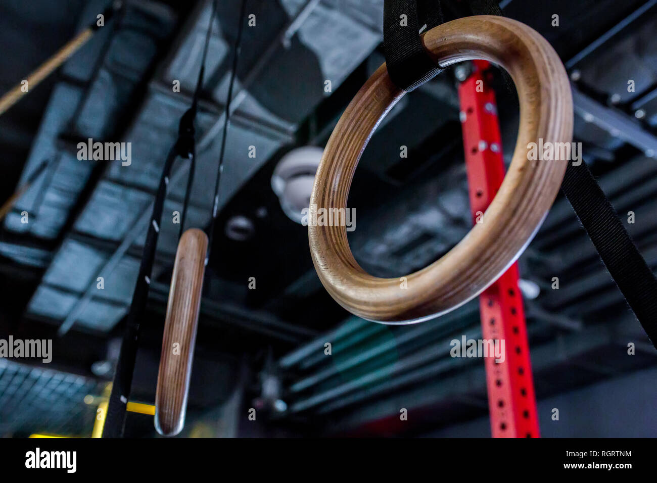 Detail of a set of rings, or steady rings, in a gymnasium. healthy ...