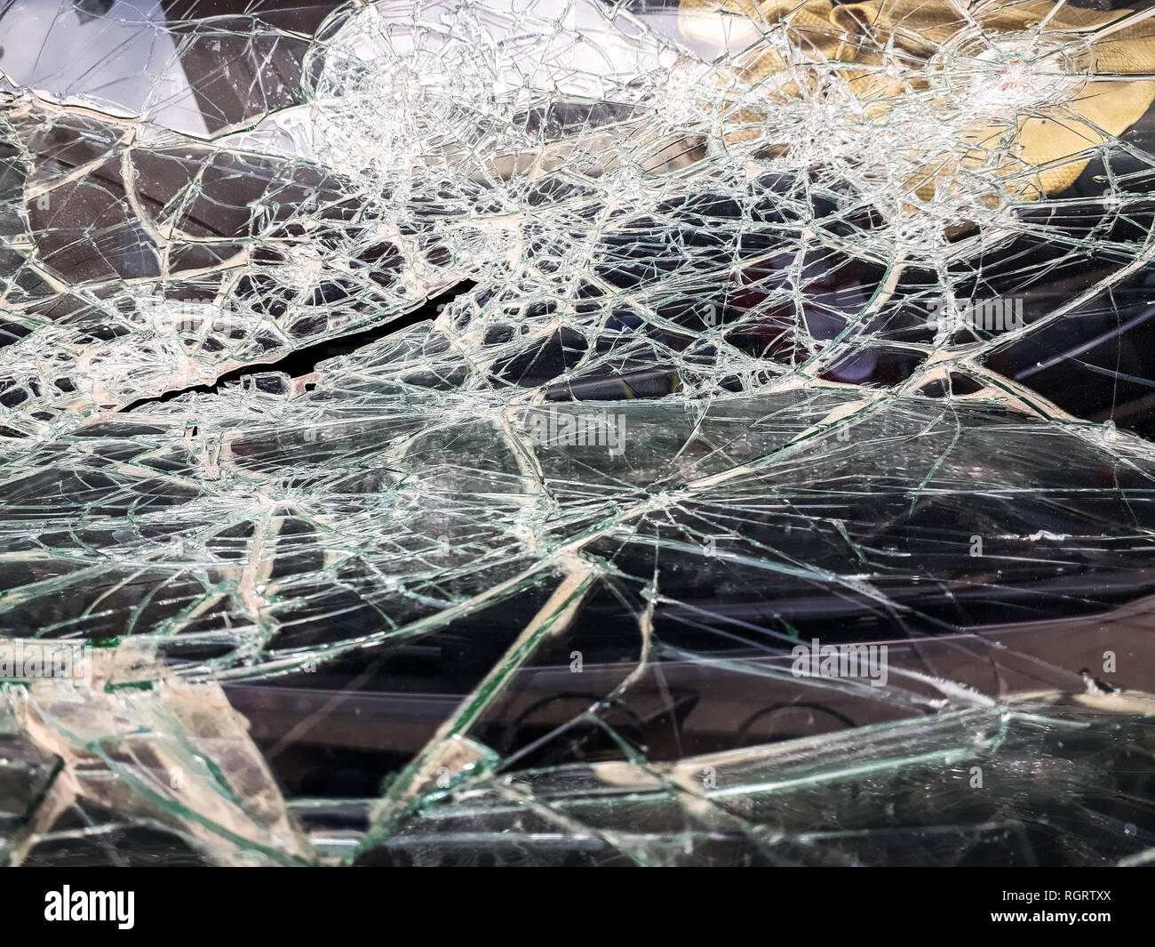 Car windshield shattered with stones by vandals Stock Photo - Alamy