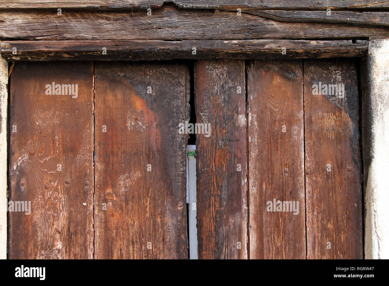 Damaged and burned wooden door after fire inferno Stock Photo - Alamy