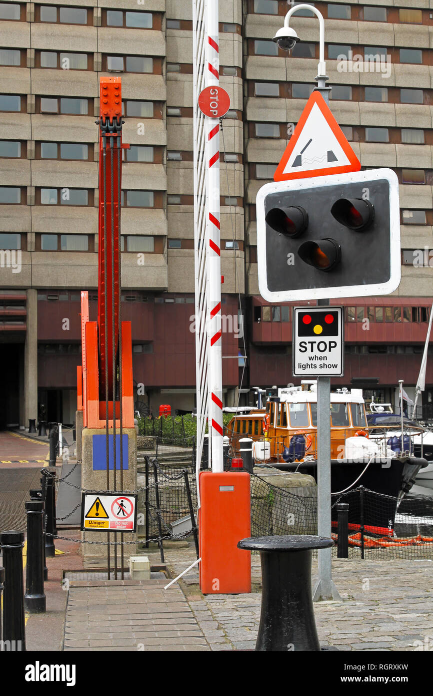 Moveable bridge sign lights and barrier ramp Stock Photo - Alamy