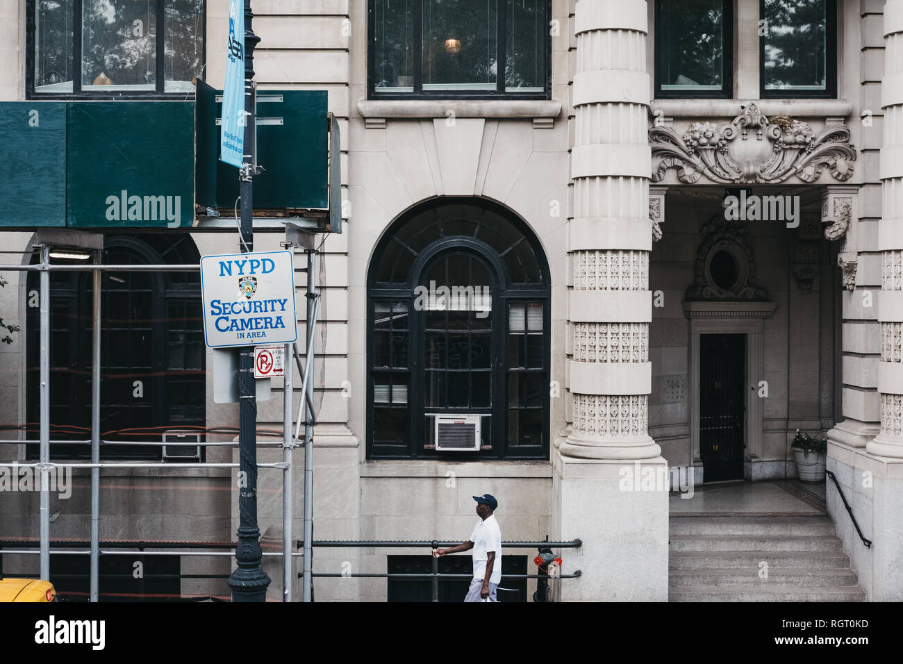 New York - June 1, 2018: African American man walking by NYPD Cameras ...