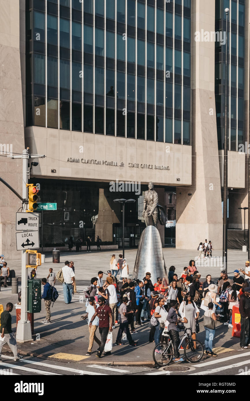 New York, USA - June 01, 2018: People by the statue of Adam Clayton ...