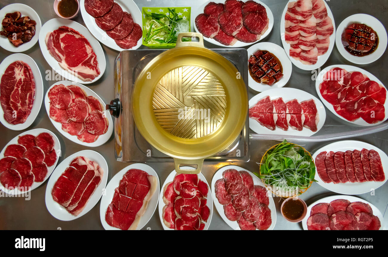 Asian BBQ-Style. sliced beef and grill hot pan Stock Photo - Alamy
