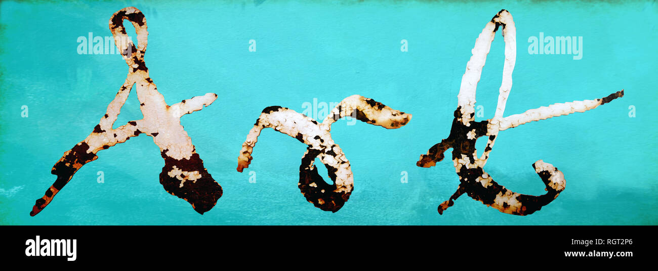 painted and rusted word Art on a turquoise wall background Stock Photo ...