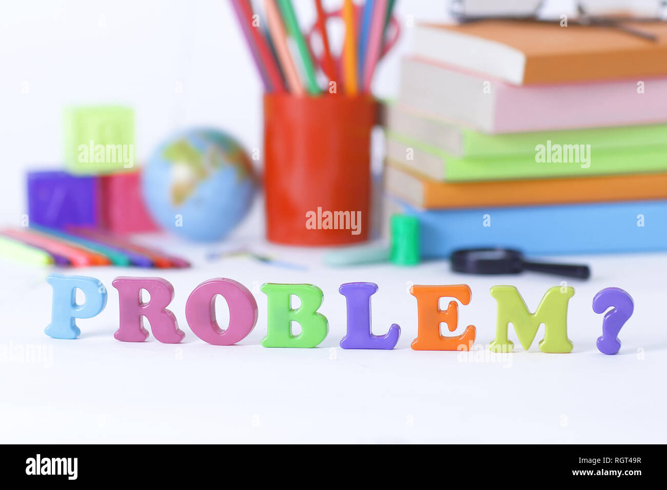 word problem on blurred background of school supplies .photo with copy ...