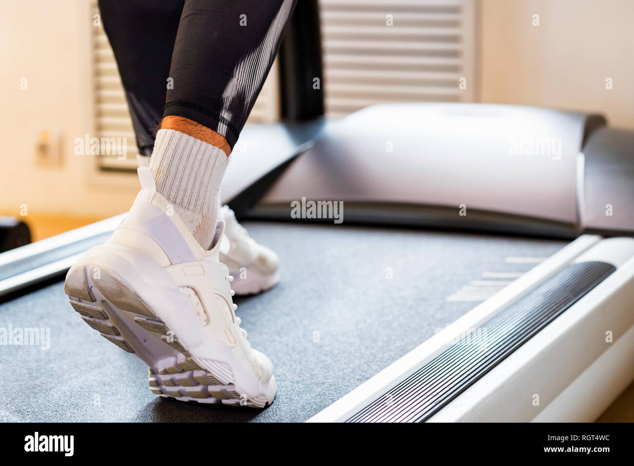 Close up female feet on modern treadmill in gym Stock Photo - Alamy