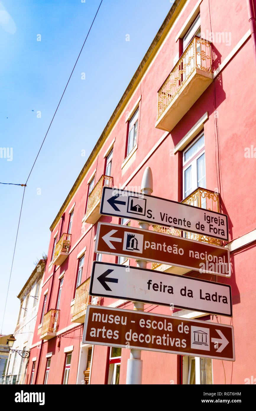Street signs in the historic center of Lisbon, Portugal. The signs read ...