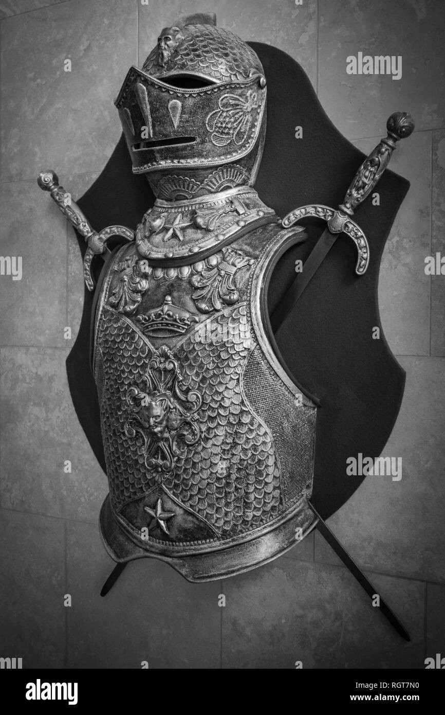 Old knight armour with helmet and crossed swords Stock Photo - Alamy