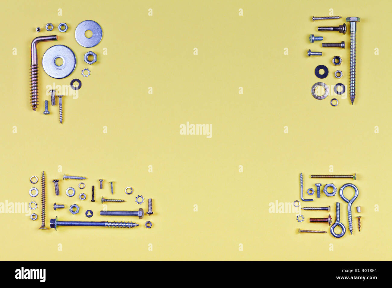 Yellow abstract background with screws and washers in the corners Stock ...