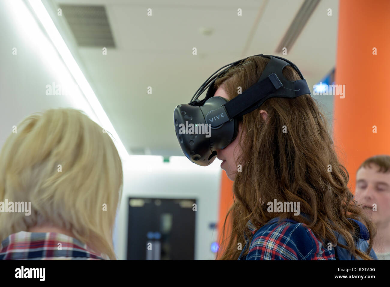 Girl wearing VR headset Stock Photo - Alamy