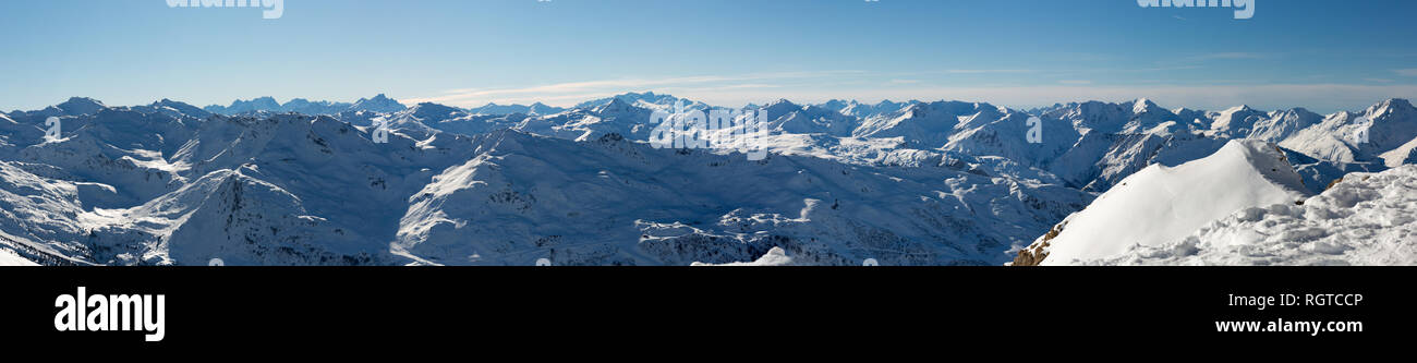 Beautiful alpine panoramic view snow capped mountains. Winter mountain ...