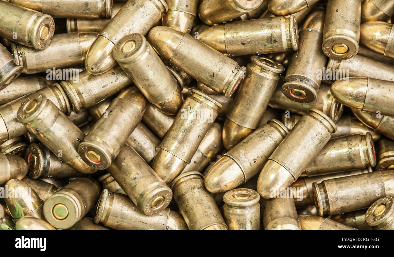 Top detail macro view of large group of gun bullets. Ammunition ...
