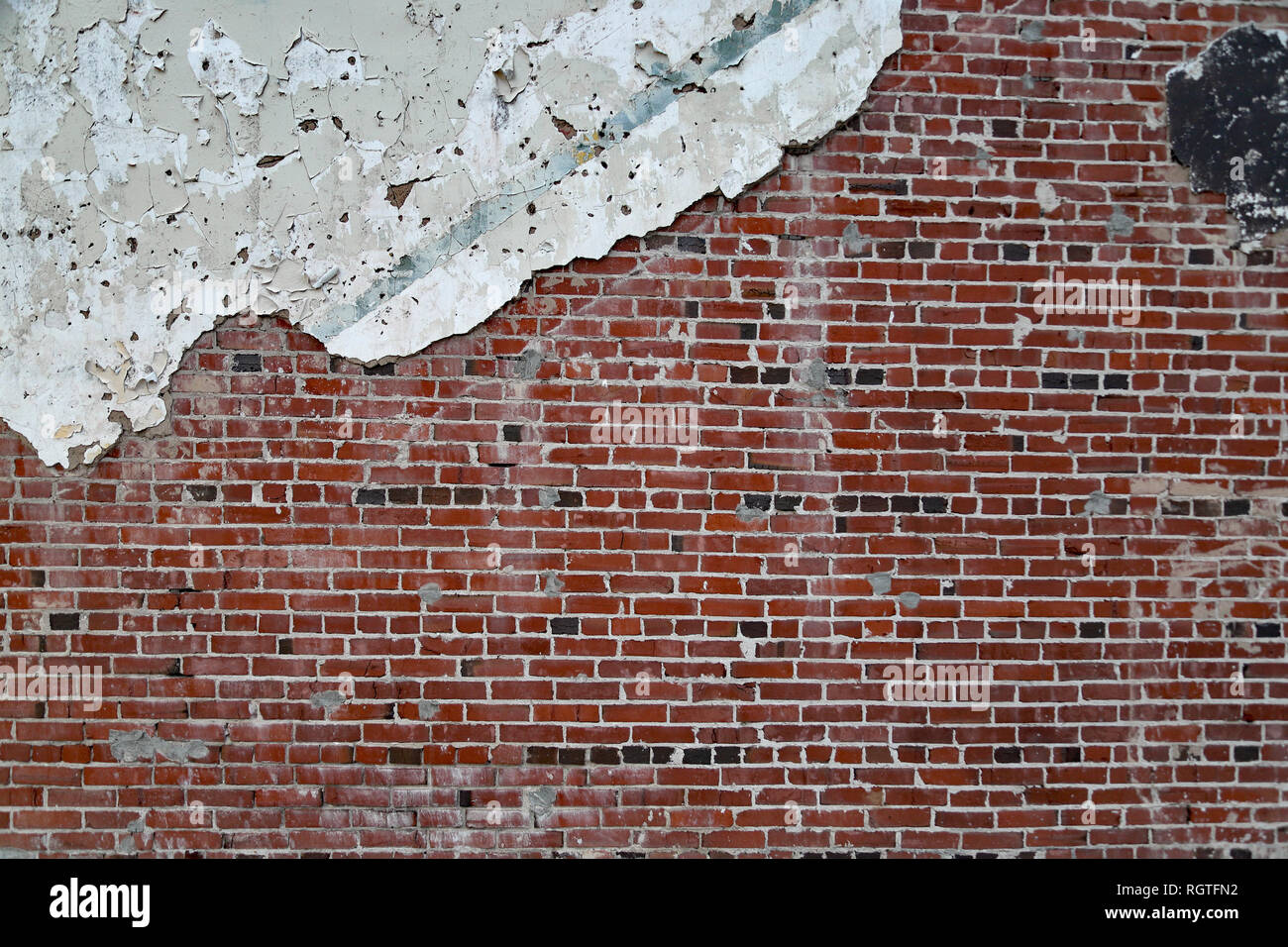 Old Vintage painted Brick and mortar wall with plaster and pealing ...