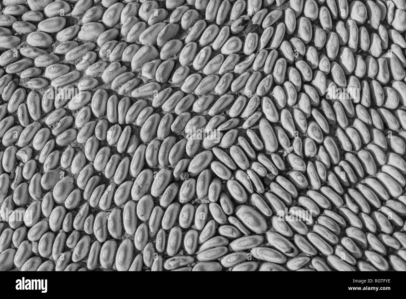 Rough pebble mosaic texture background in cement. Textured closeup ...