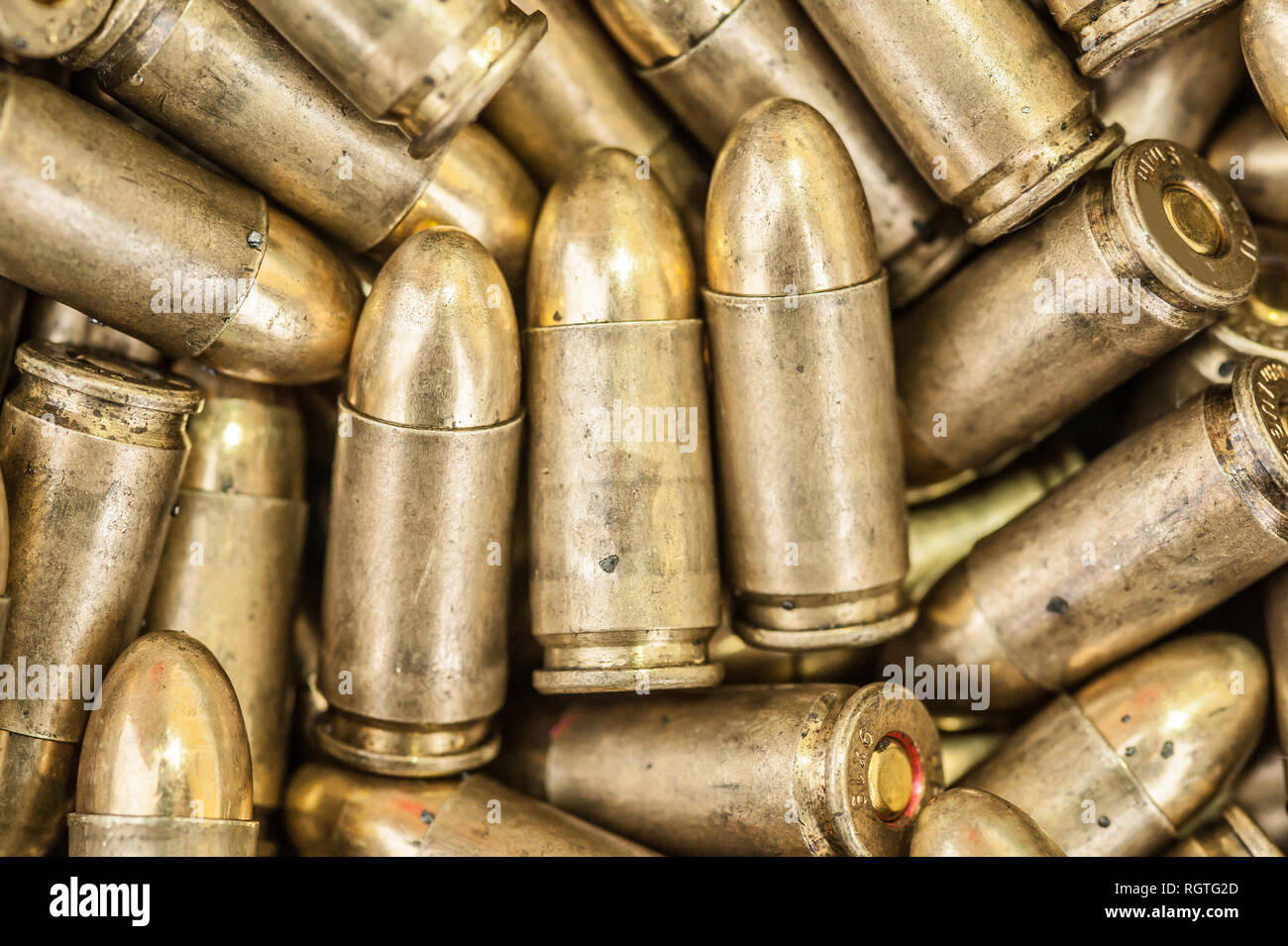 Top detail macro view of large group of gun bullets. Ammunition ...