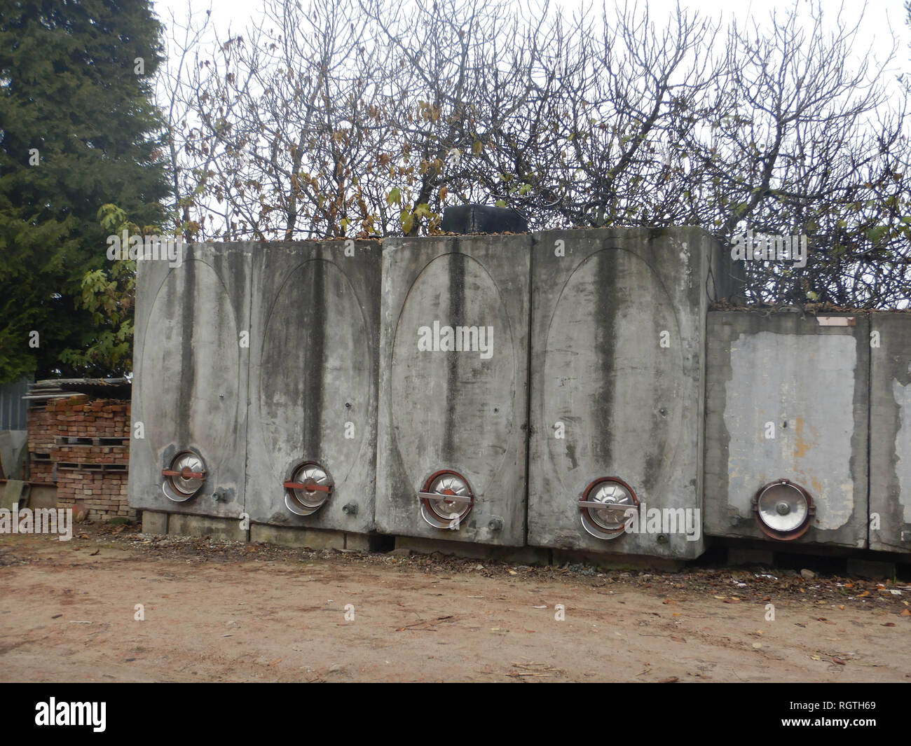 Five old concrete cisterns for wine in a Langhe farmhouse, Piedmont ...