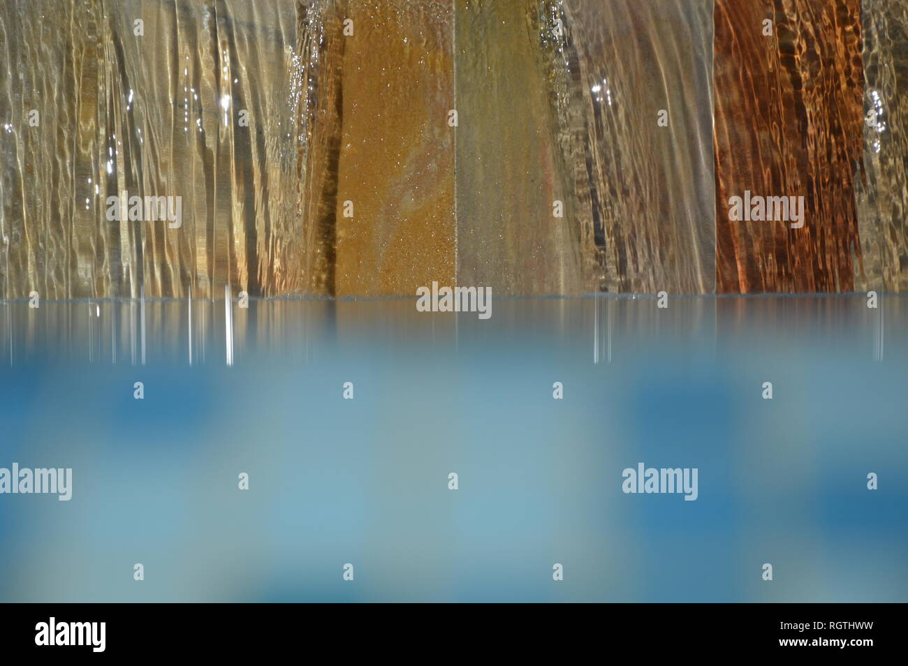 Zoom on a small waterfall from a Swimming pool Stock Photo - Alamy