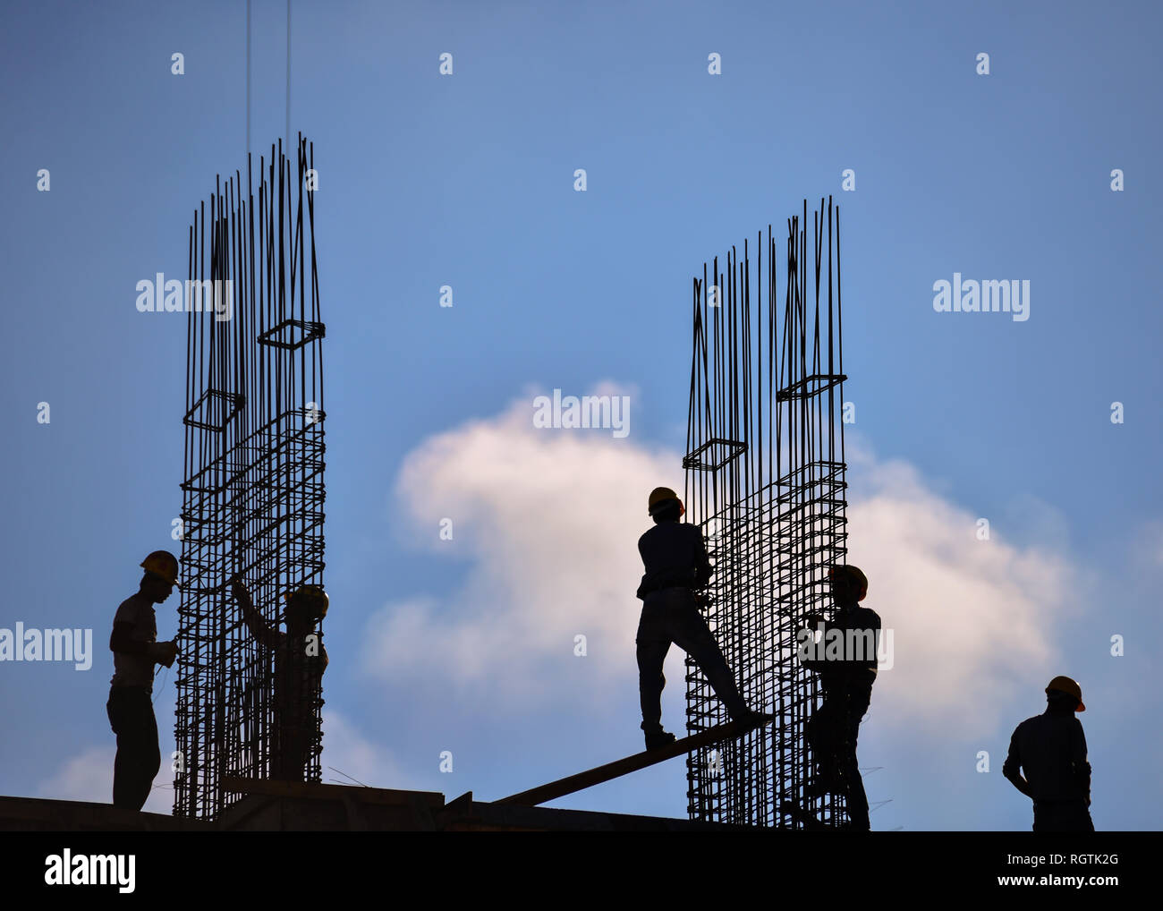 Silhouette of people working and building construction Stock Photo - Alamy