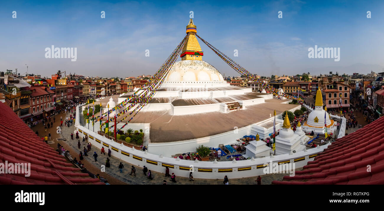 Panoramic view on the big stupa with fluttering prayer flags in Boudha ...