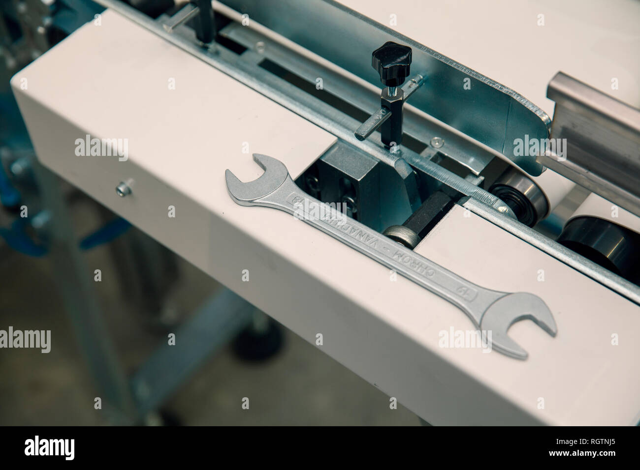 spanner on machine, tool for loosening screws Stock Photo - Alamy
