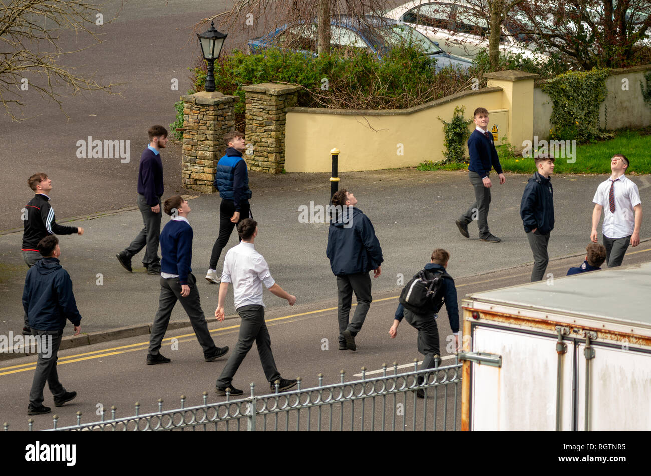 Group of male Irish students hanging out on the streets in Killarney ...