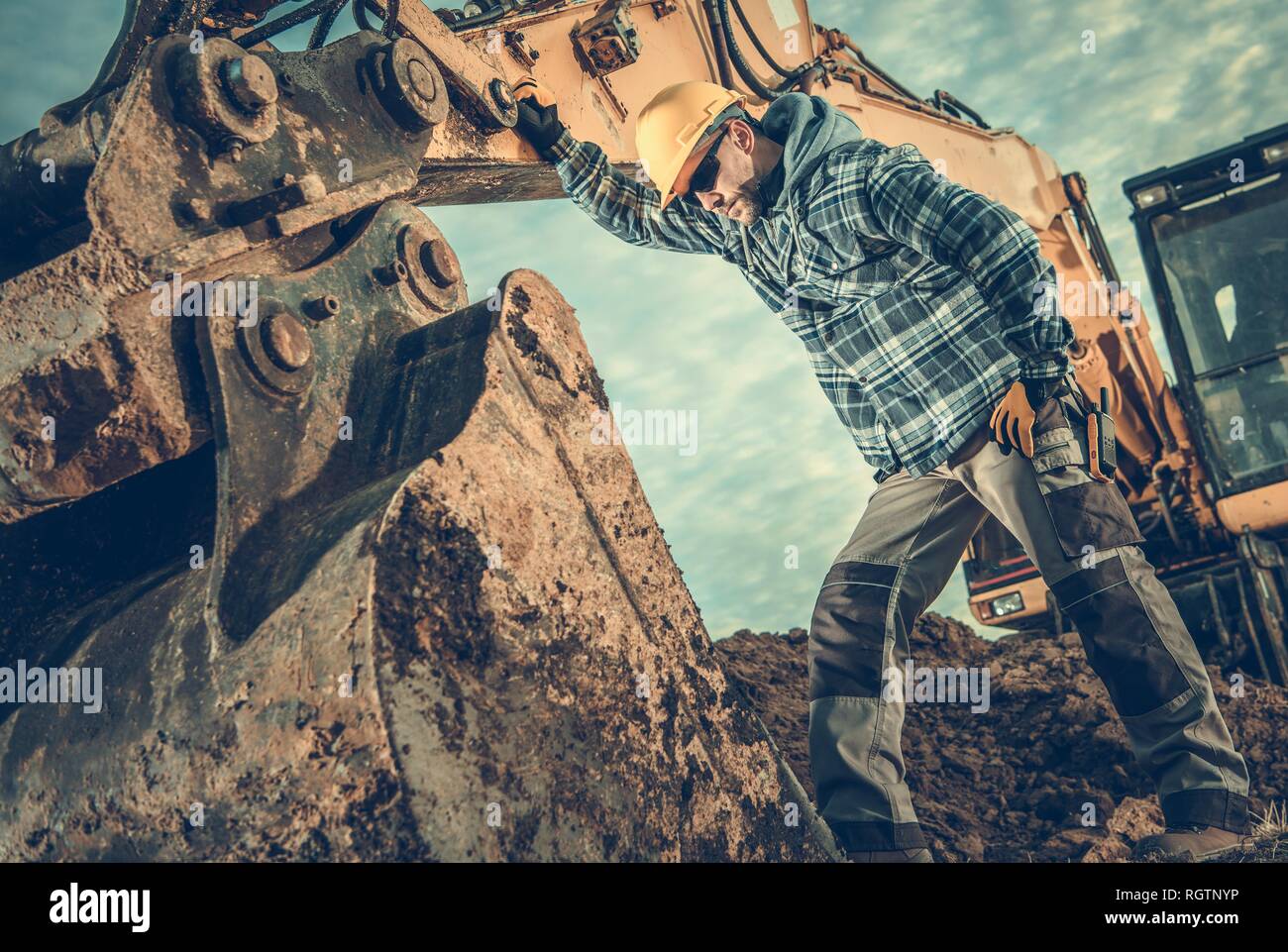 Construction Industry. Heavy Equipment Operator Job. Excavator and ...