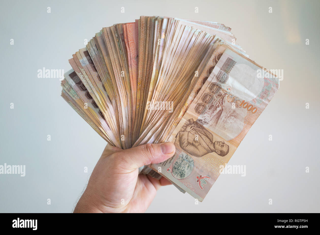 hands counting of thousansds Thai baht money.Close up Human counting ...