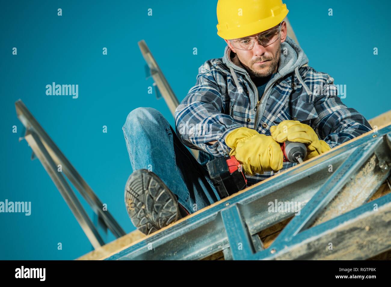Steel Skeleton Building Construction Worker in His 30s Installing ...