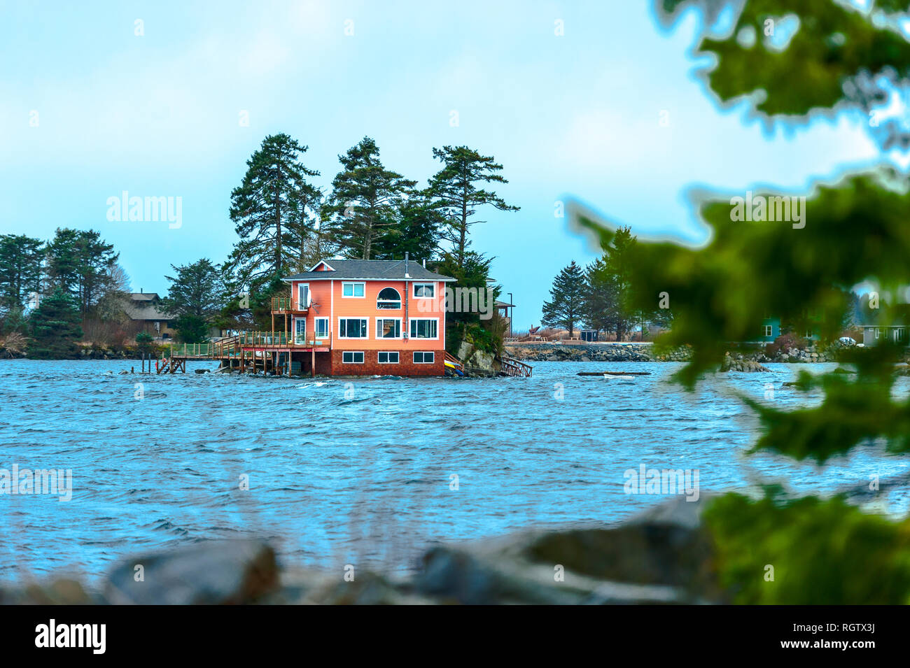 Tourist cabin on small tidal island in Sitka, Alaska, USA Stock Photo ...