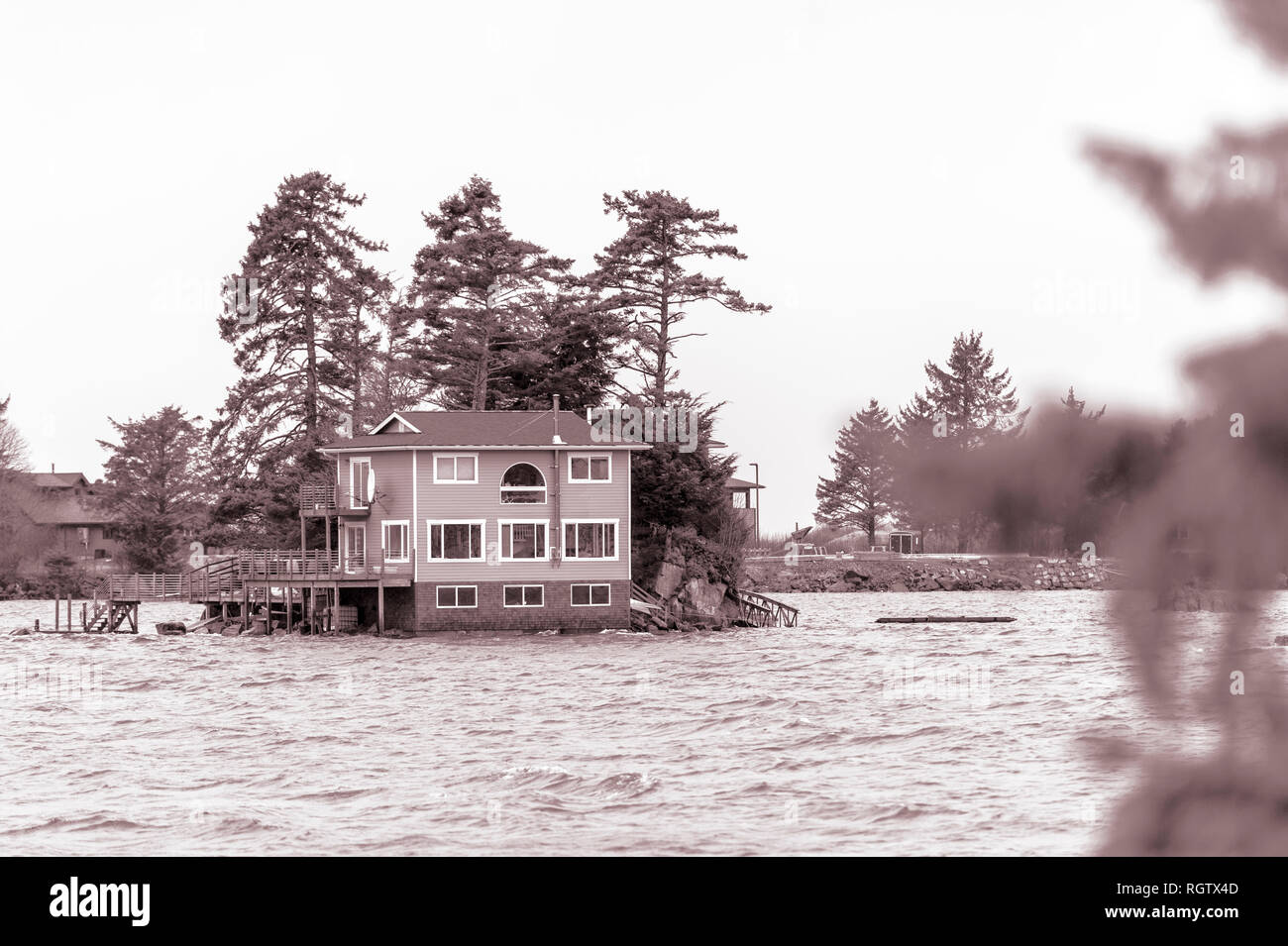 Tourist cabin on small tidal island in Sitka, Alaska, USA Stock Photo ...