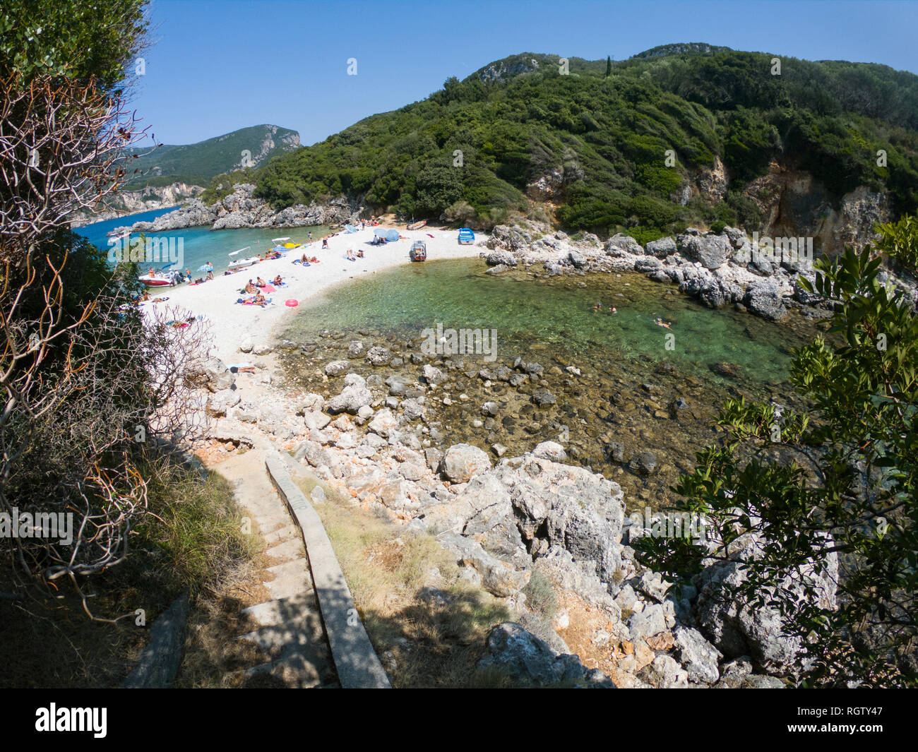LIMNI, CORFU, GREECE - AUGUST 29, 2018: Tourists sunbathing in summer ...