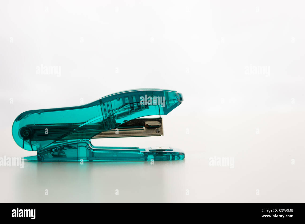 aqua colored Transparent Stapler. isolated with a white background ...