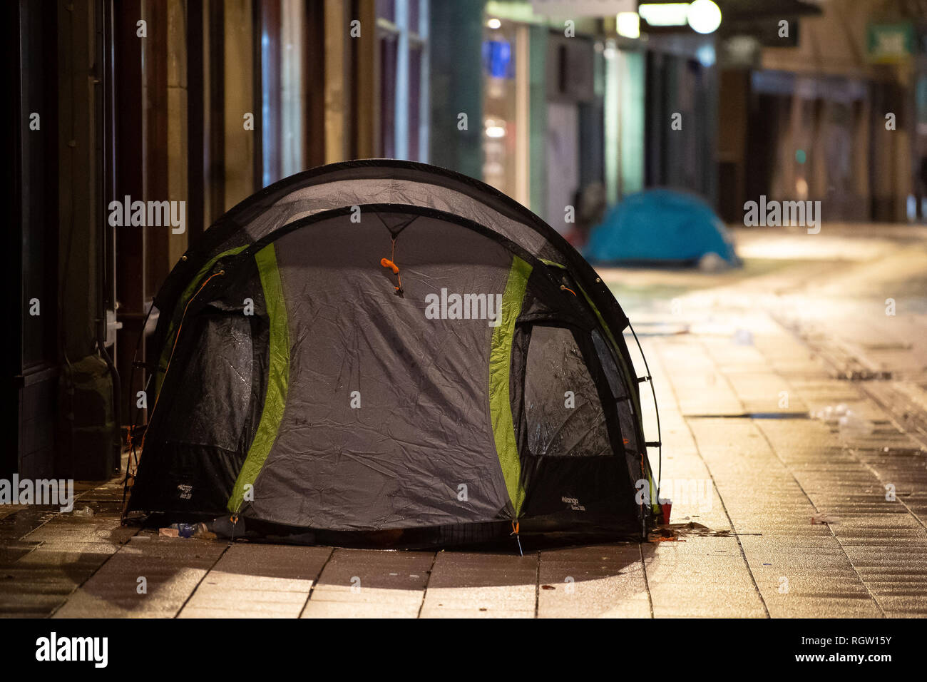 A grey and green homeless tent at night on Queen Street in Cardiff ...