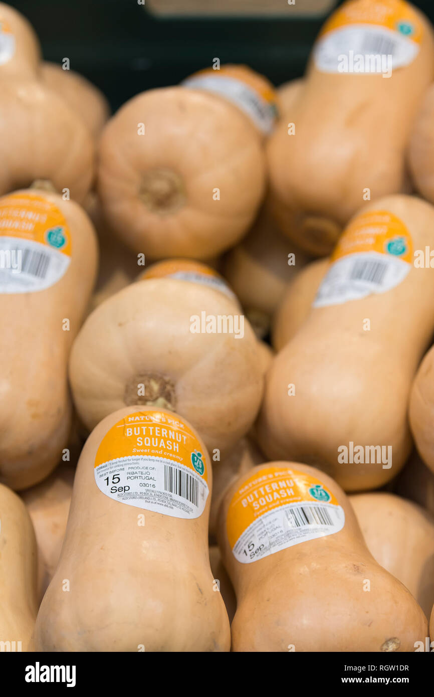 A selection of butternut squash on sale in a supermarket in the UK ...