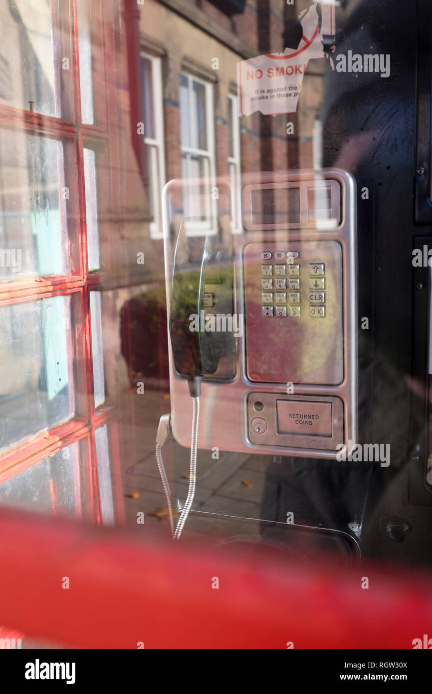 Red british telecom telephone box hi-res stock photography and images ...