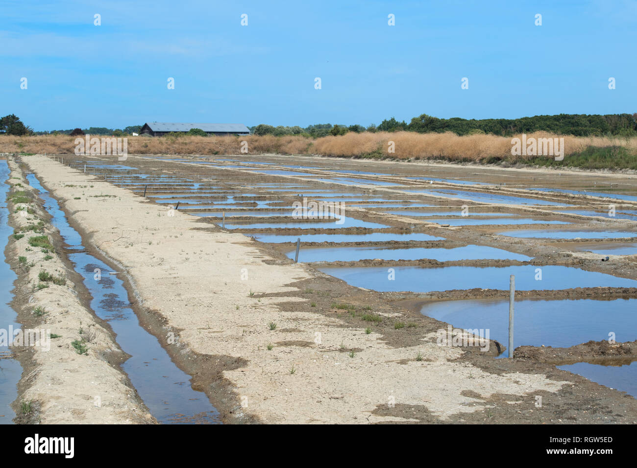 Ile de Ré salt lakes wheelbarrow and other tools Stock Photo - Alamy